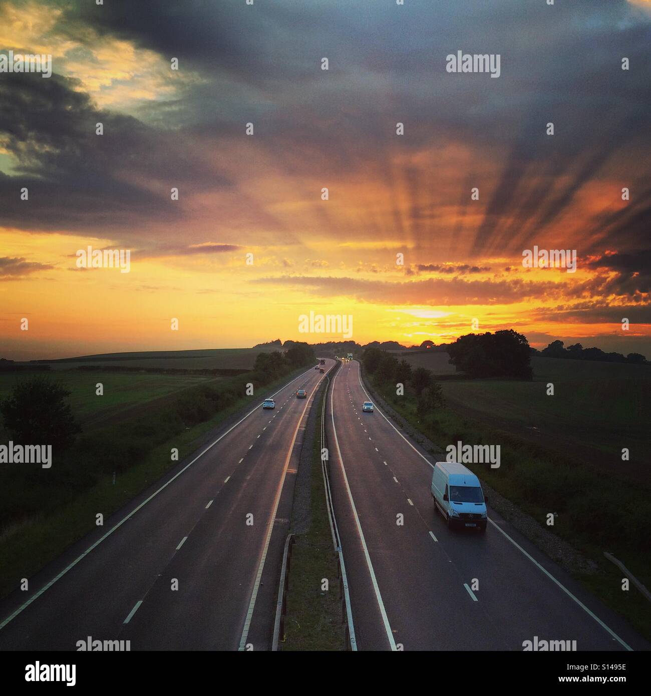Spectacular sunset over British motorway Stock Photo - Alamy