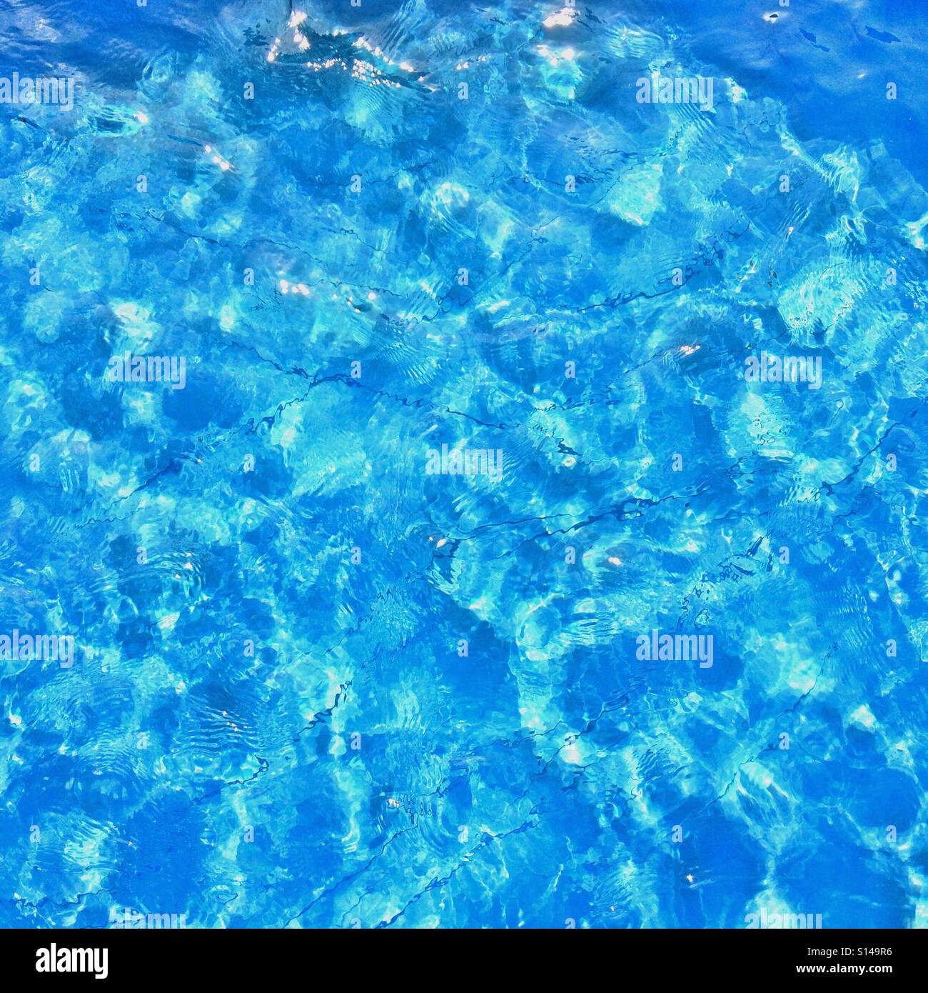 Blue swimming pool water Stock Photo - Alamy