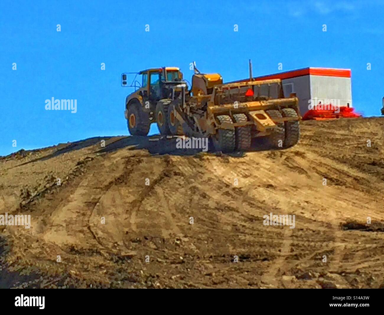 Heavy road construction equipment Stock Photo - Alamy