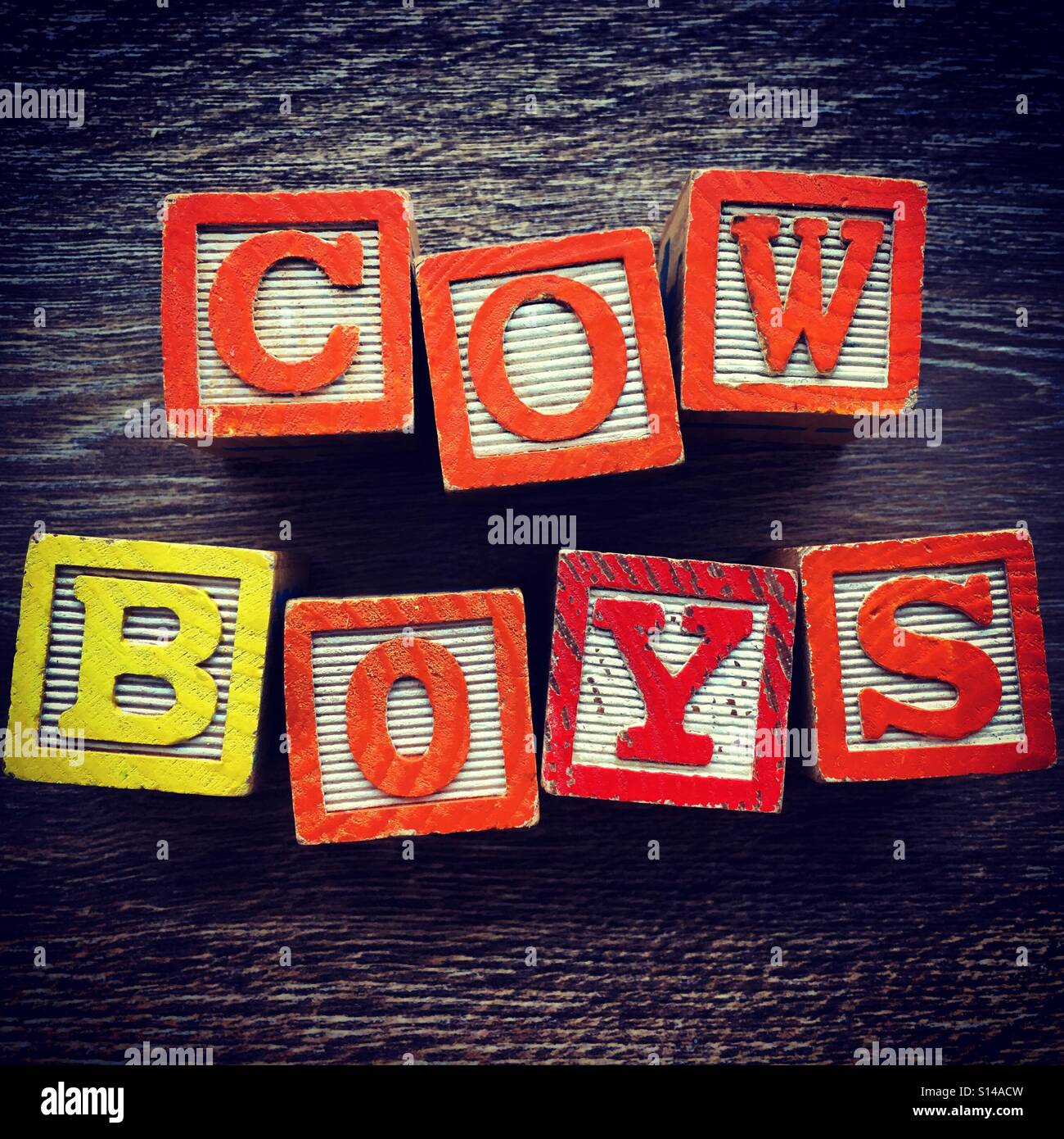 COW BOYS word written with wood block characters Stock Photo - Alamy