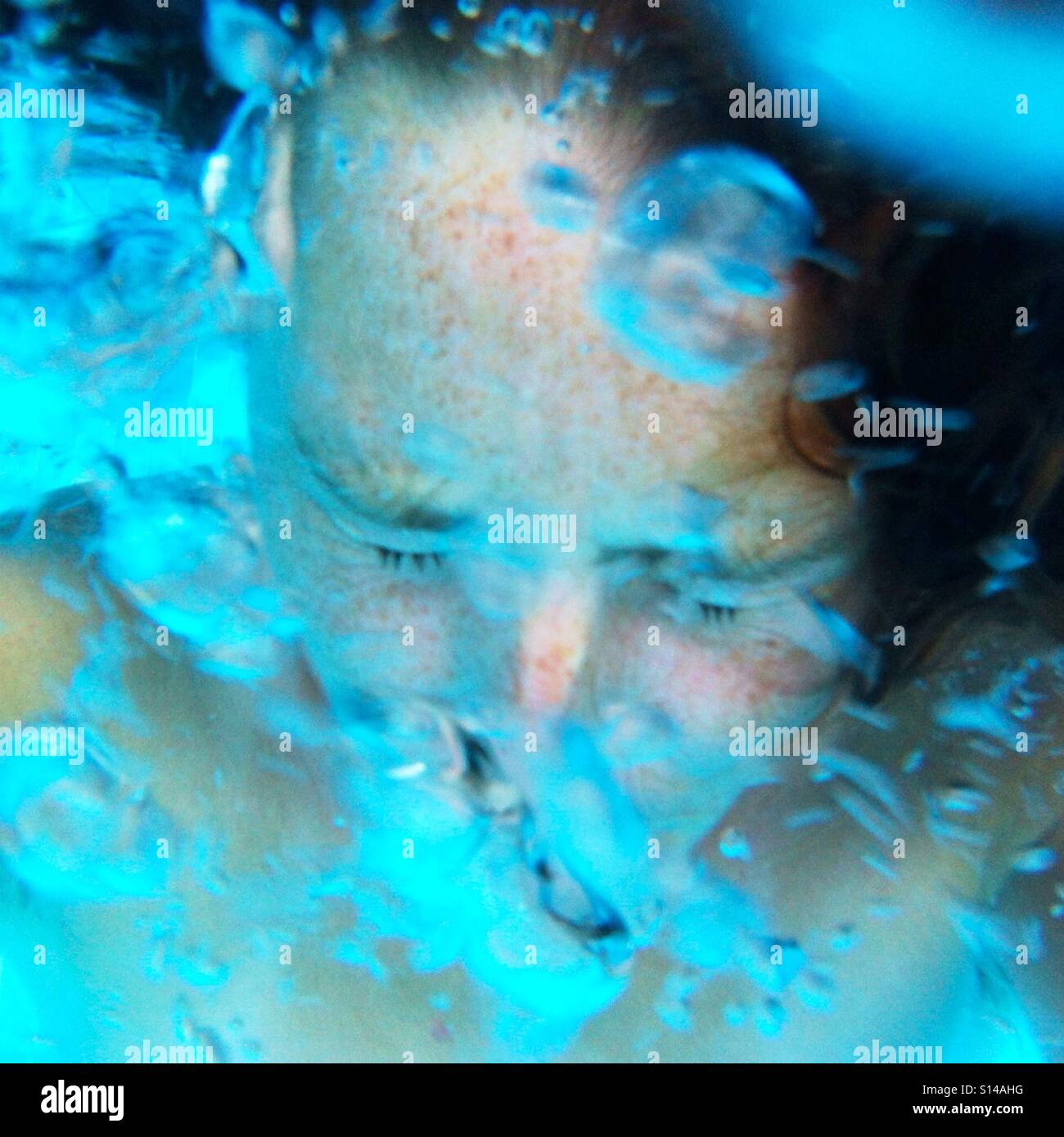 Woman bubbles underwater hi-res stock photography and images - Alamy