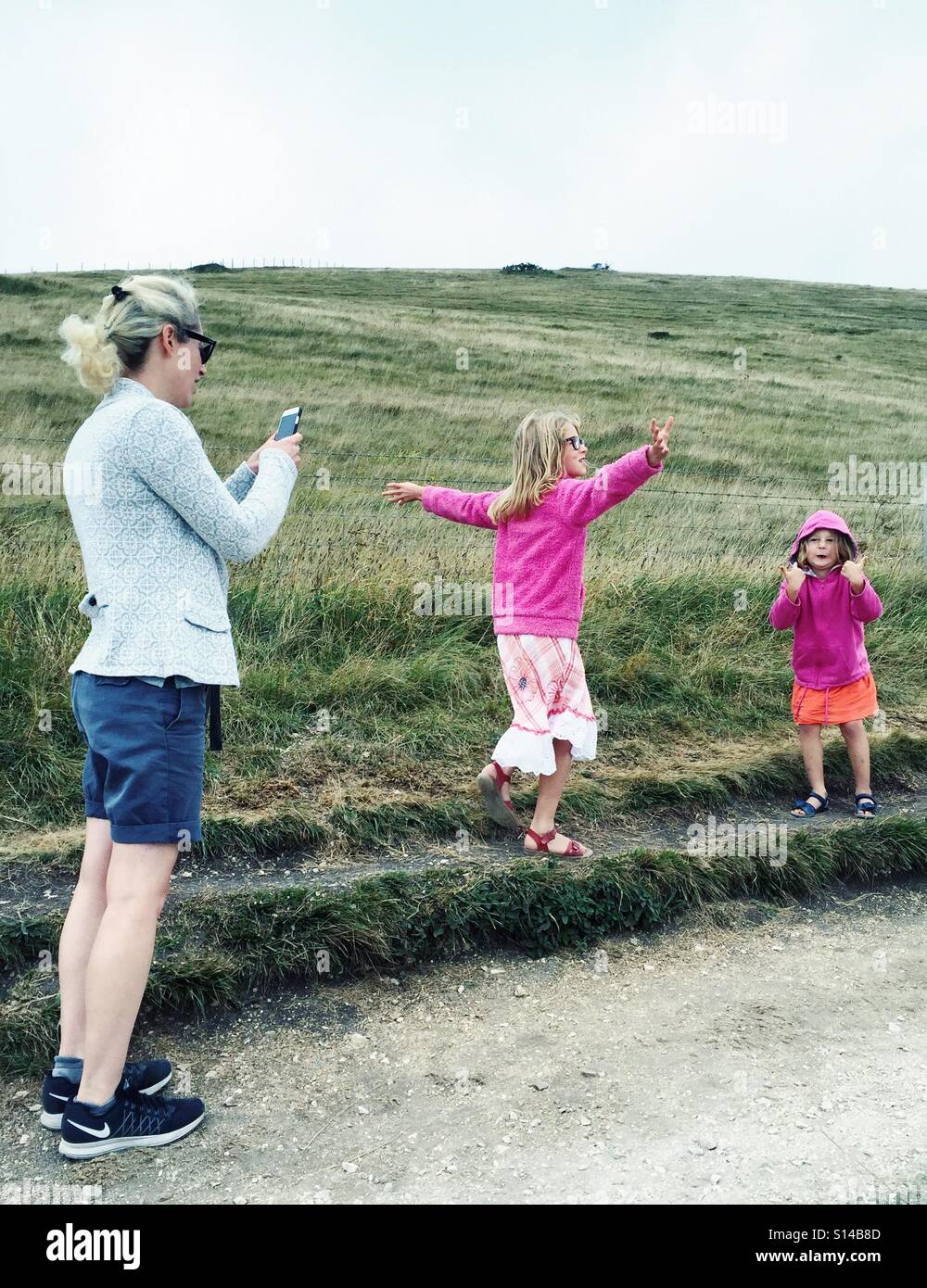 Filming kids with iPhone Stock Photo - Alamy