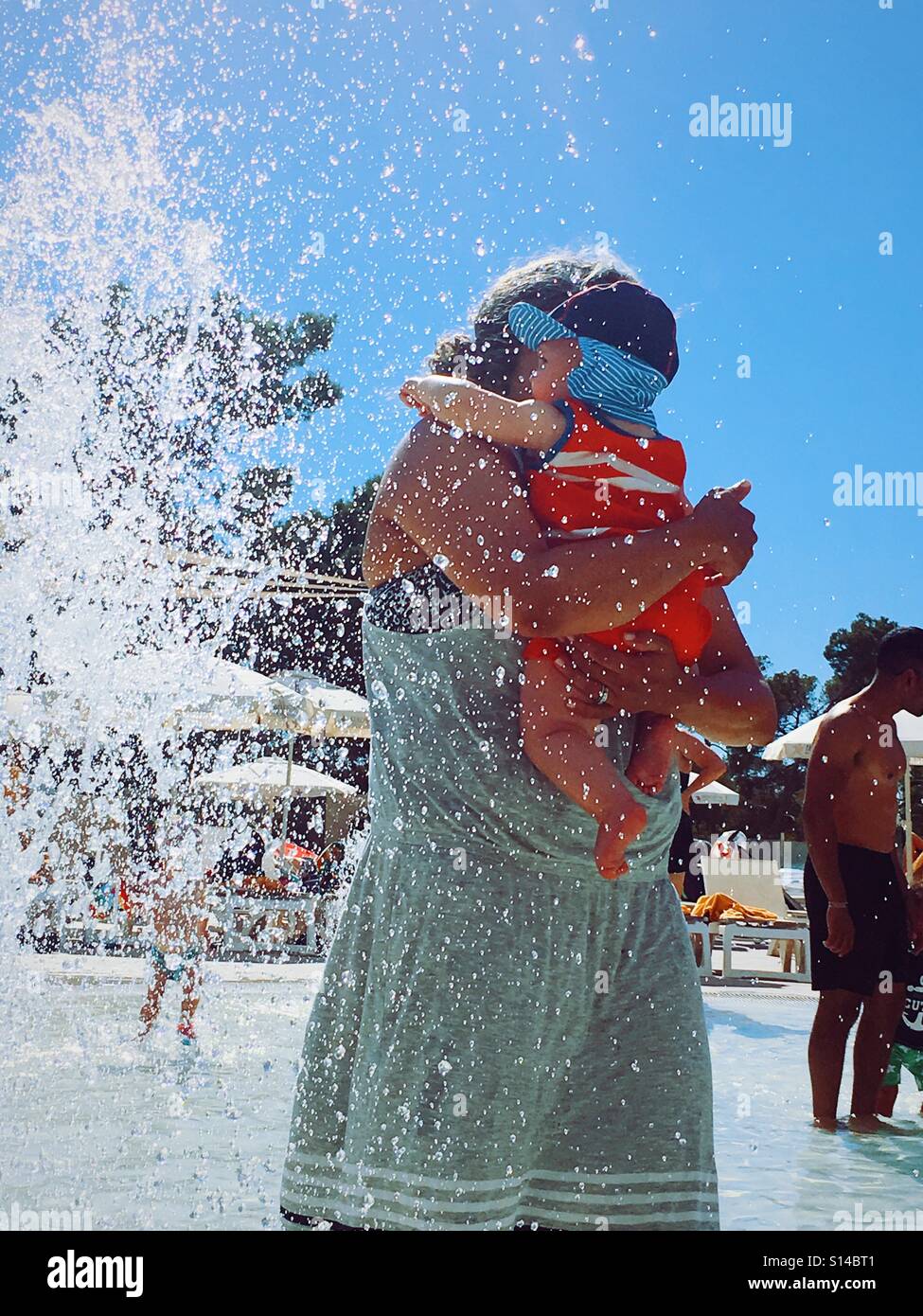 Baby swimming in the sea hi-res stock photography and images - Alamy