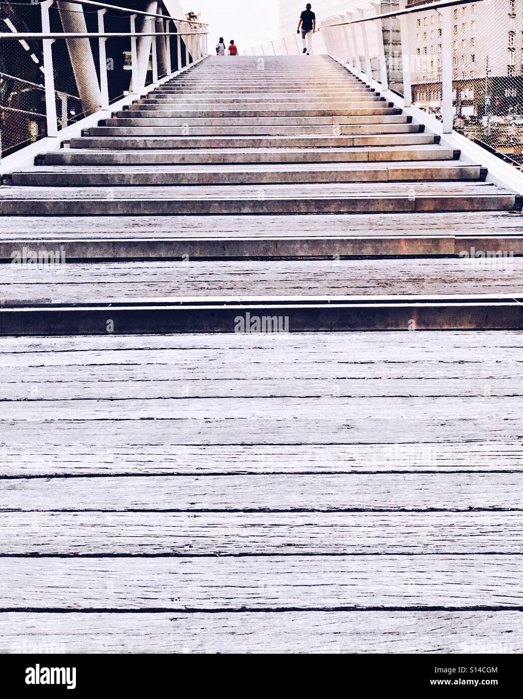 Man walking up stairs hi-res stock photography and images - Alamy