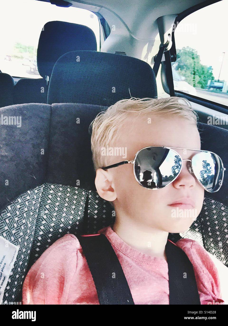 Young boy wearing shades Stock Photo - Alamy Young boy wearing shades Stock Photo - Alamy