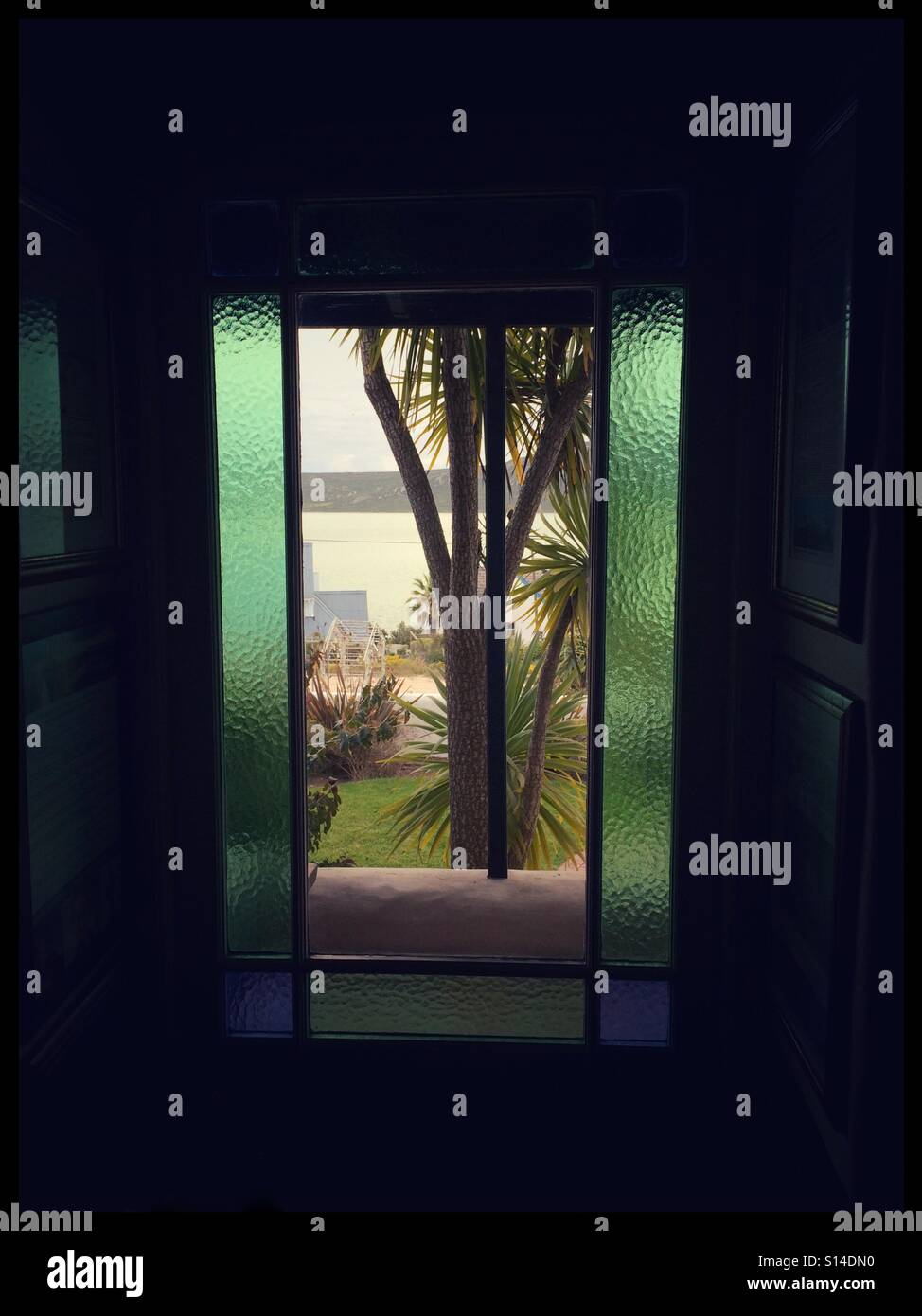 View through stained glass window Stock Photo - Alamy