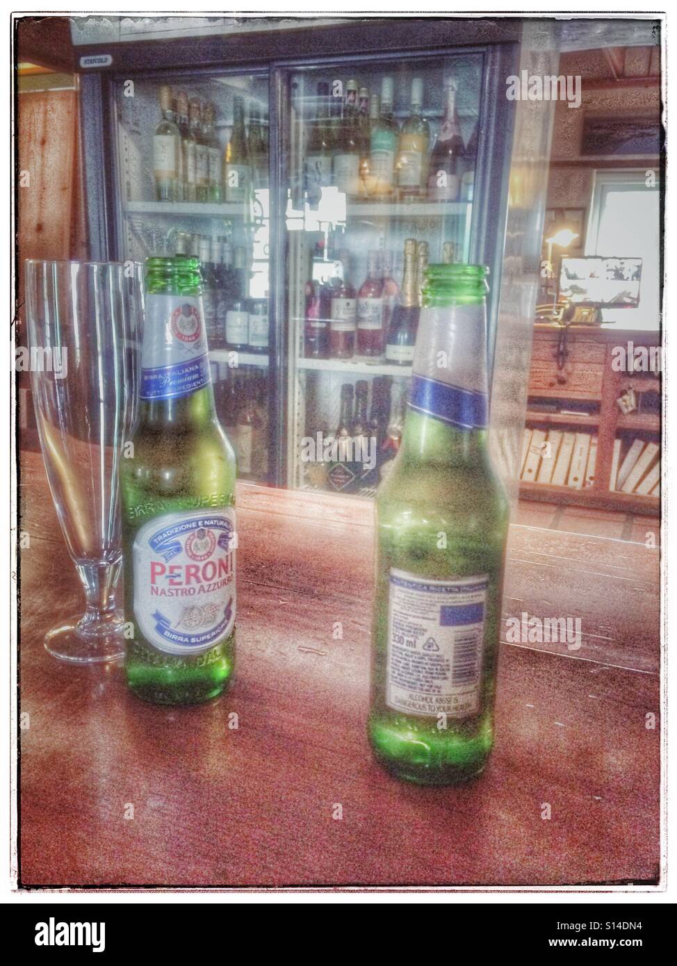 Peroni beer on bar counter Stock Photo - Alamy