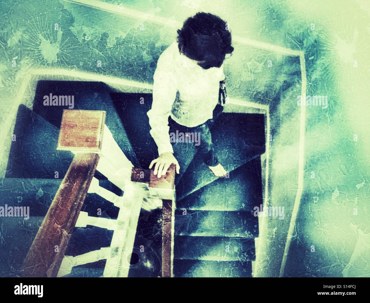 Woman going downstairs, wearing flip flops and holding bannister Stock ...