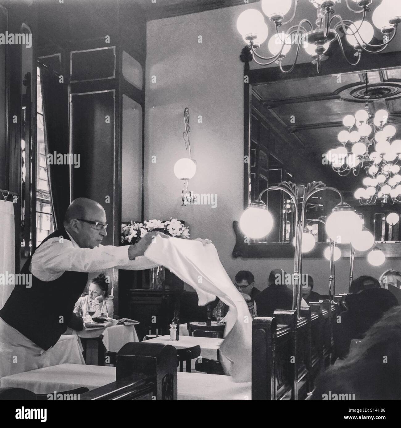 Traditional restaurant waiter table hi-res stock photography and images ...