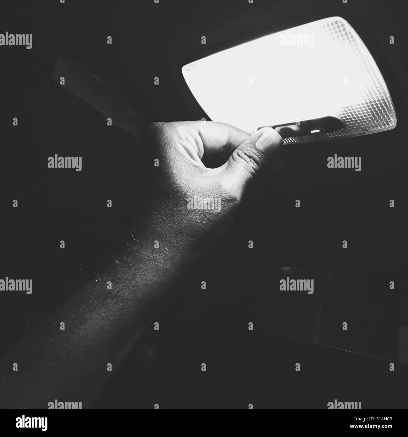 Hand turning on light hi-res stock photography and images - Alamy