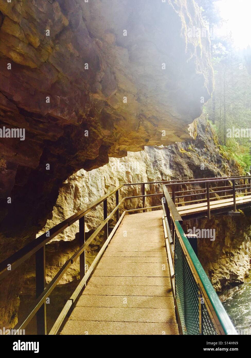 Walkway over canyon Stock Photo - Alamy