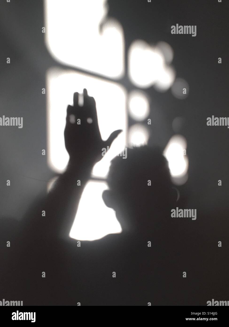 Hand shadows wall hi-res stock photography and images - Alamy