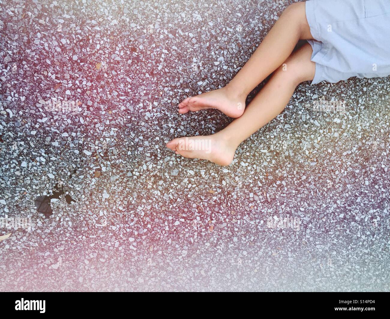 Legs and feet of little boy hi-res stock photography and images - Alamy