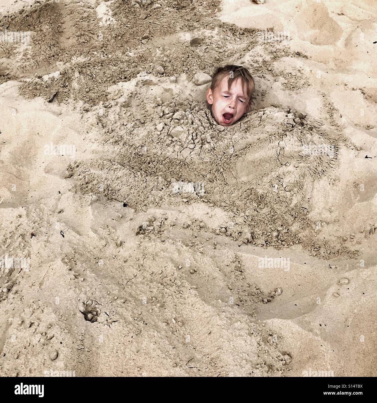 Buried up to neck hi-res stock photography and images - Alamy