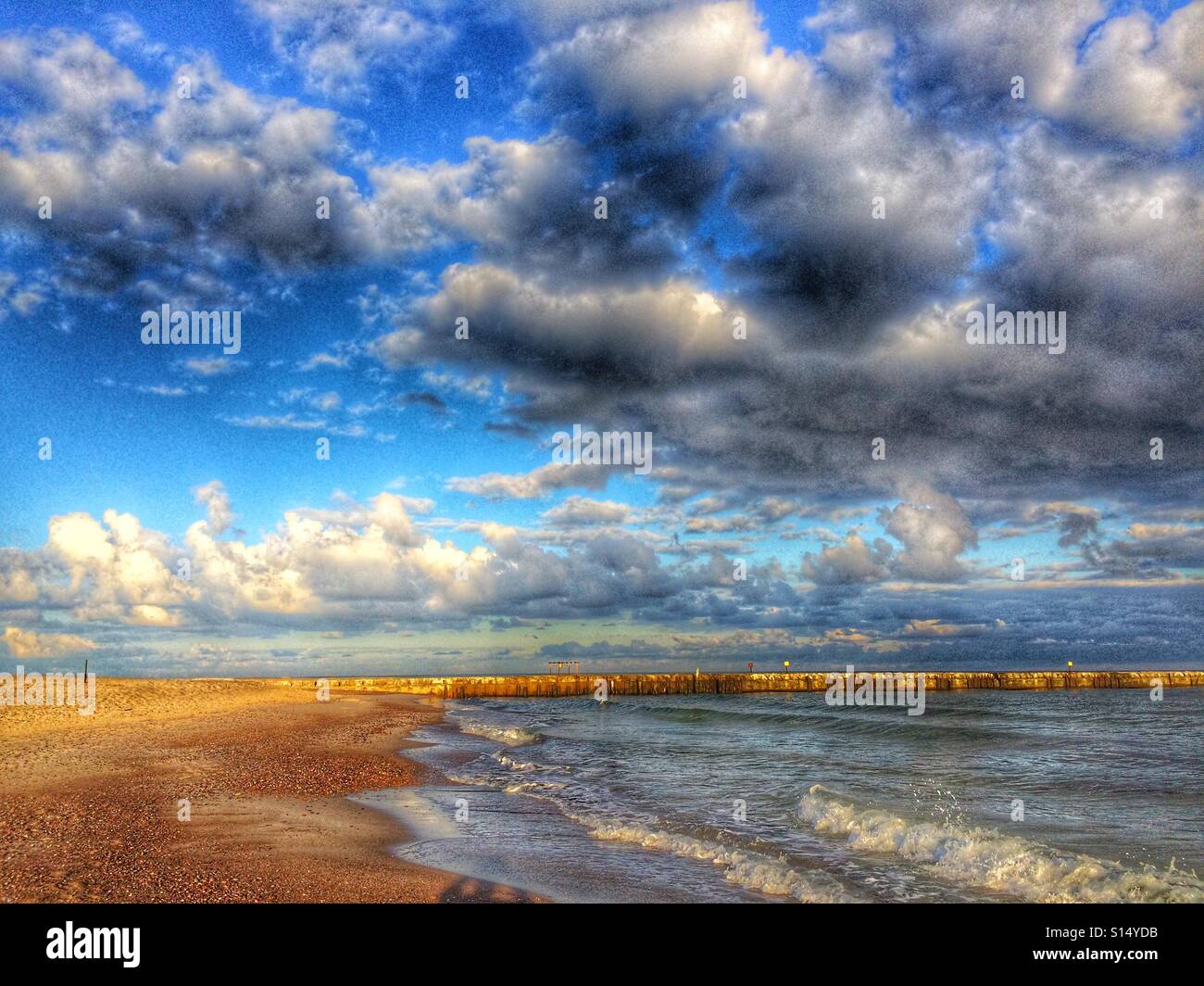 Beach with clouds Stock Photo - Alamy