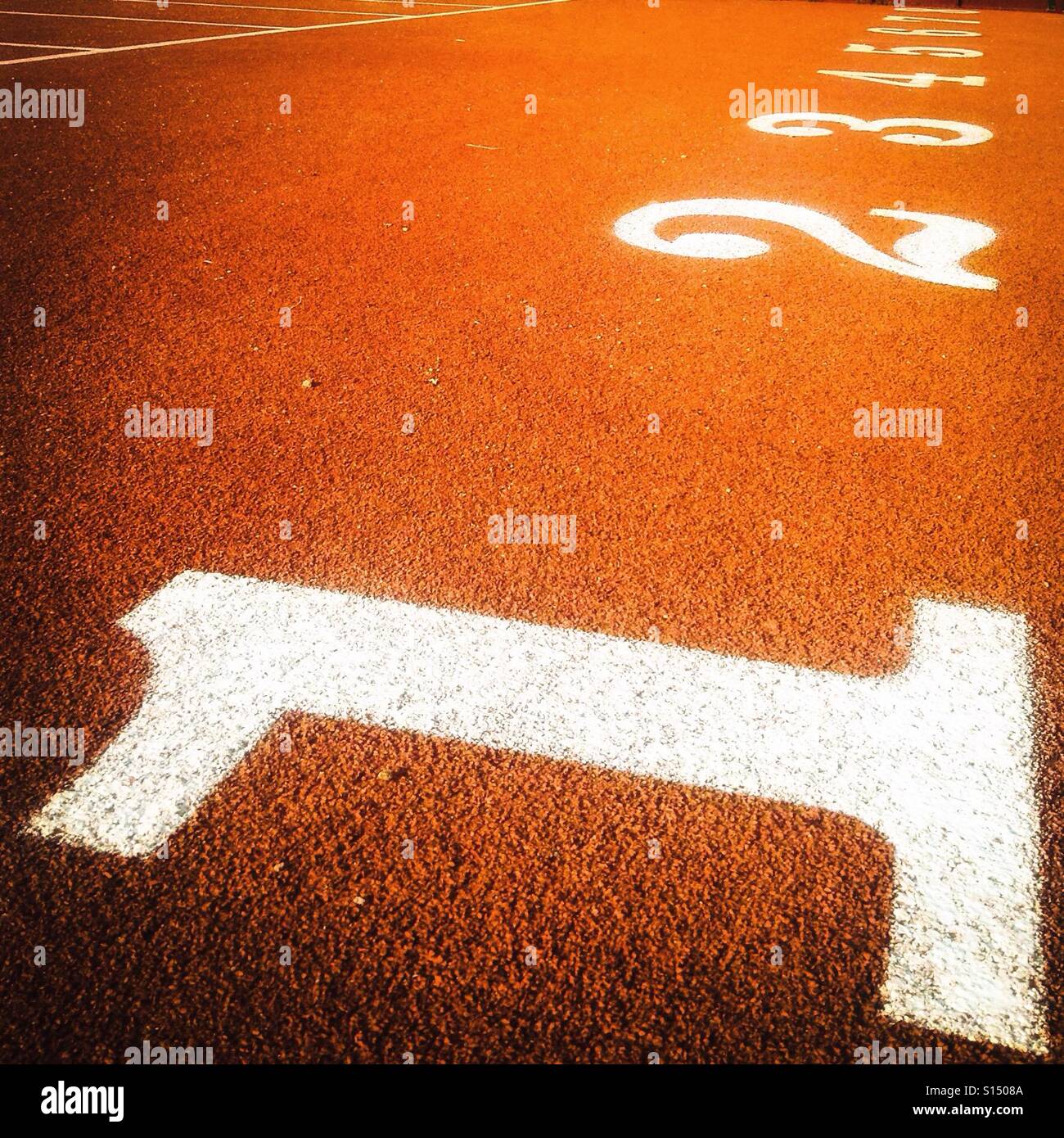 Ordinal numbers on an athletic field track Stock Photo - Alamy