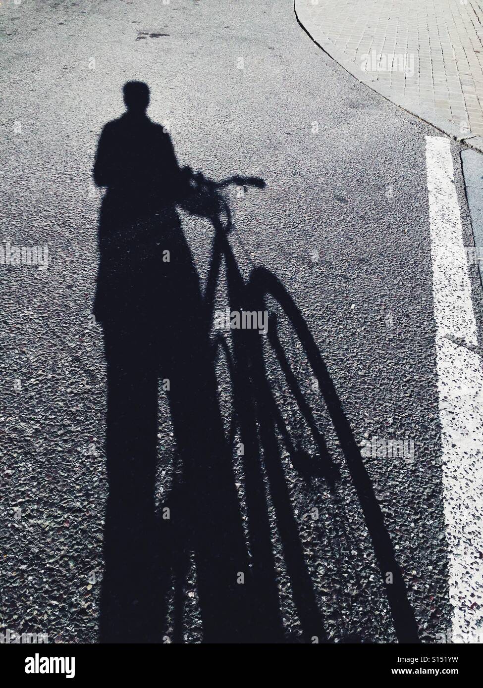 Shadow of a cyclist hi-res stock photography and images - Alamy