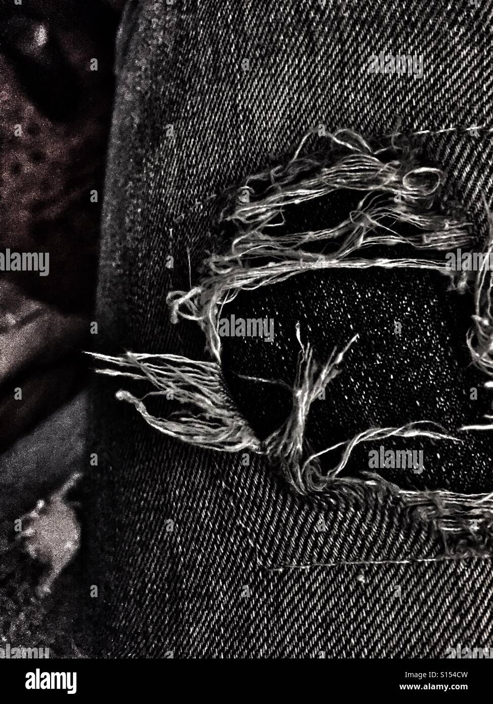 Frayed denim hi-res stock photography and images - Alamy