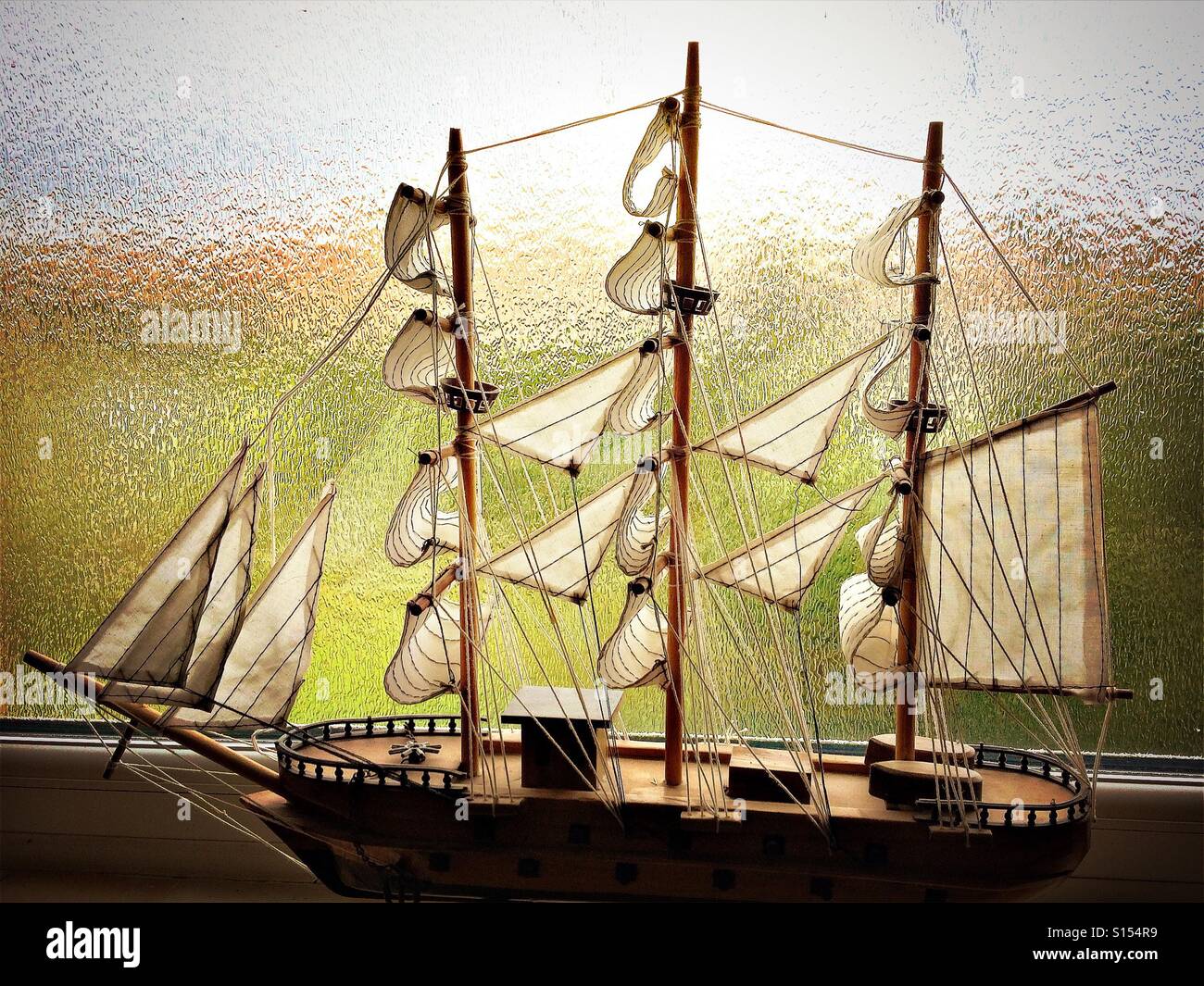 Model boat in a window Stock Photo - Alamy