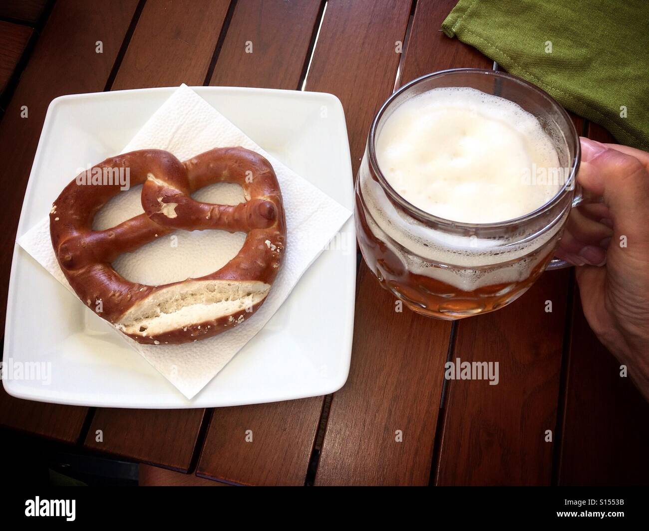 Hot pretzel and cold beer at Oktoberfest Stock Photo - Alamy