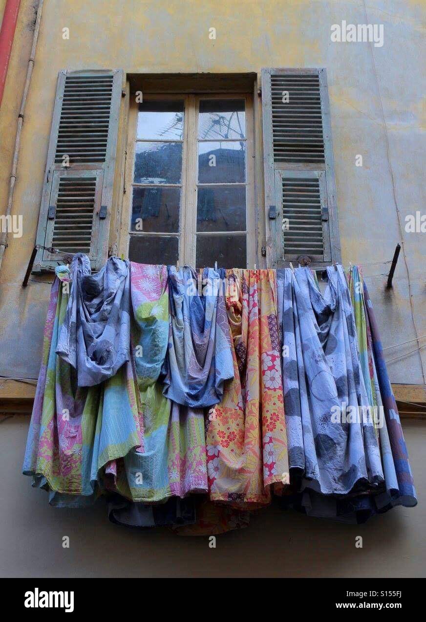 Washing line in the window hi-res stock photography and images - Alamy