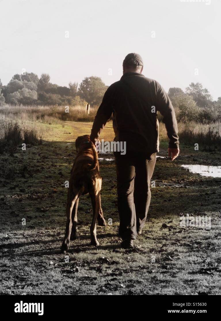 Man and dog Stock Photo - Alamy