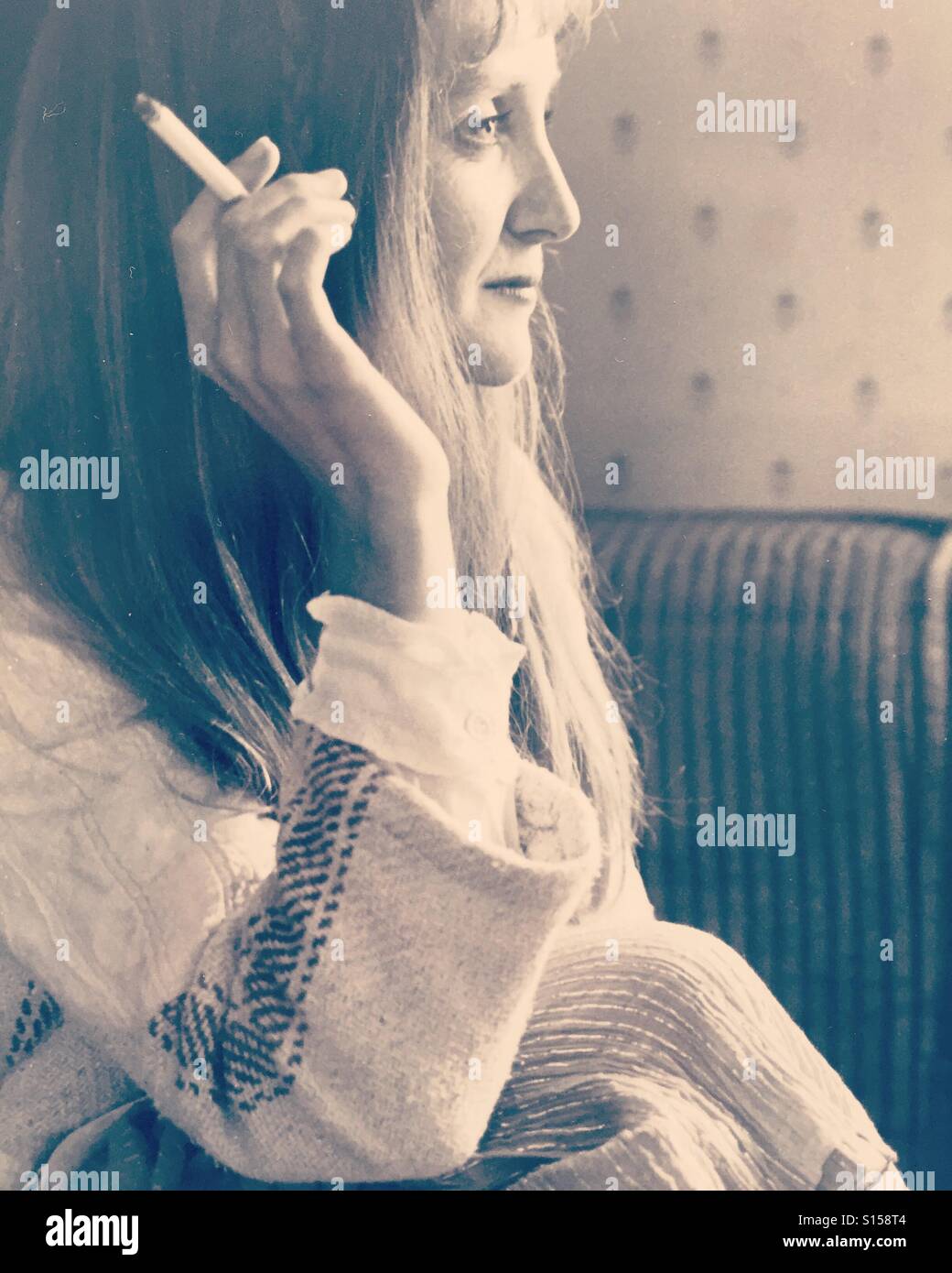 70s woman smoking hi-res stock photography and images - Alamy