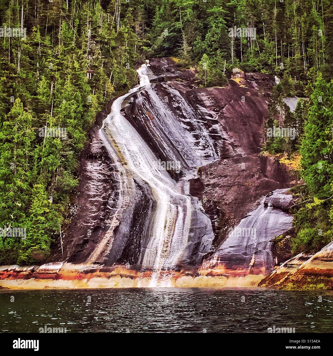 Lacy Falls cascades into the Tribune Channel in the remote and ...