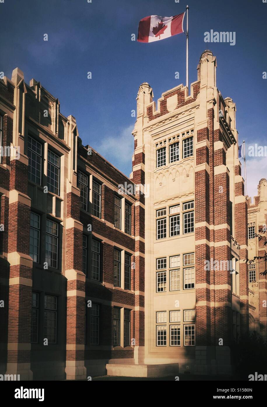 Evening light glows on Heritage Hall, SAIT's landmark building and the ...