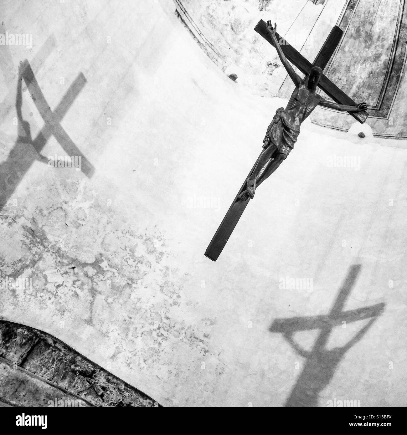 Jesus on the cross and his reflection Stock Photo - Alamy