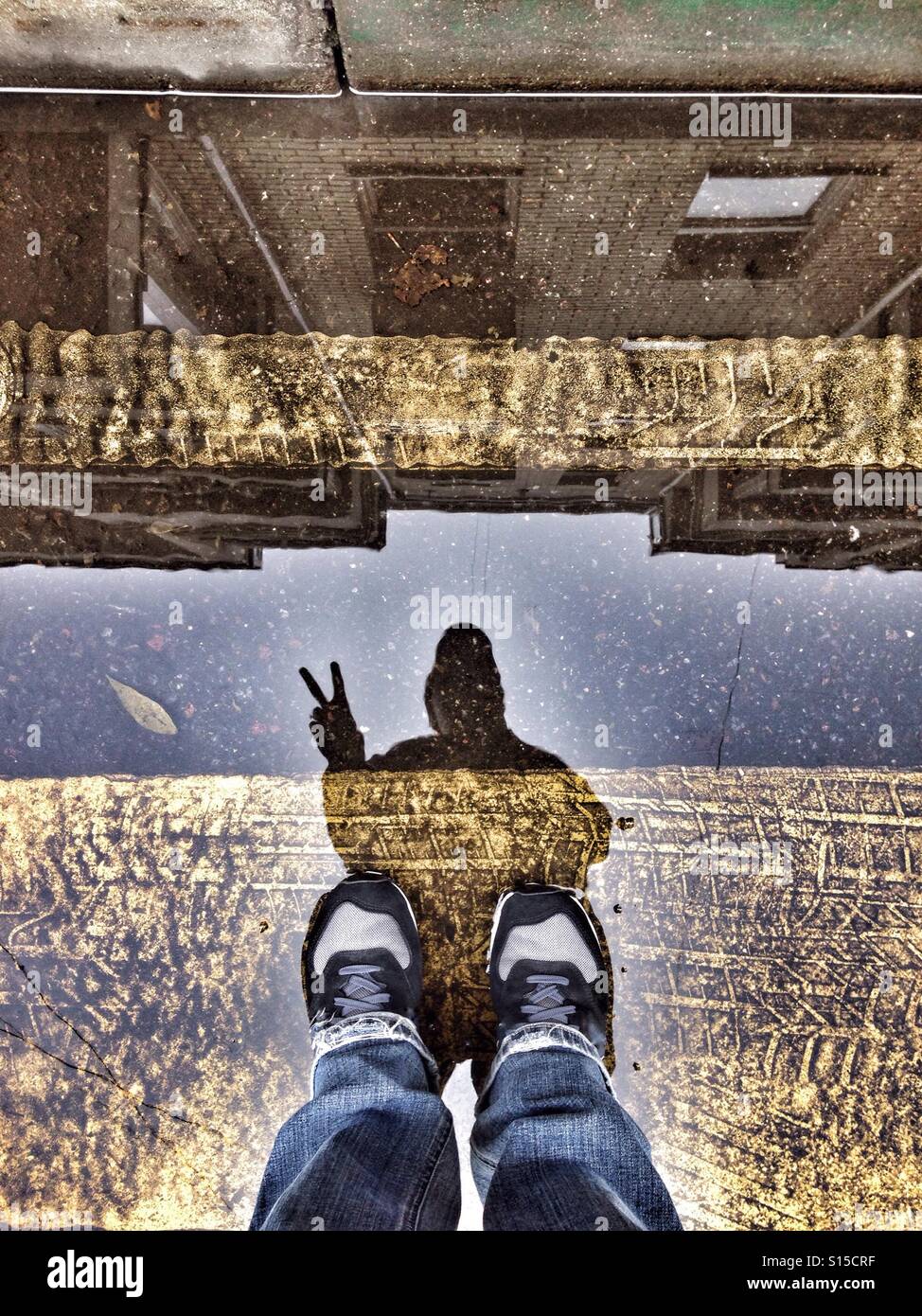 Reflection in a puddle Stock Photo - Alamy