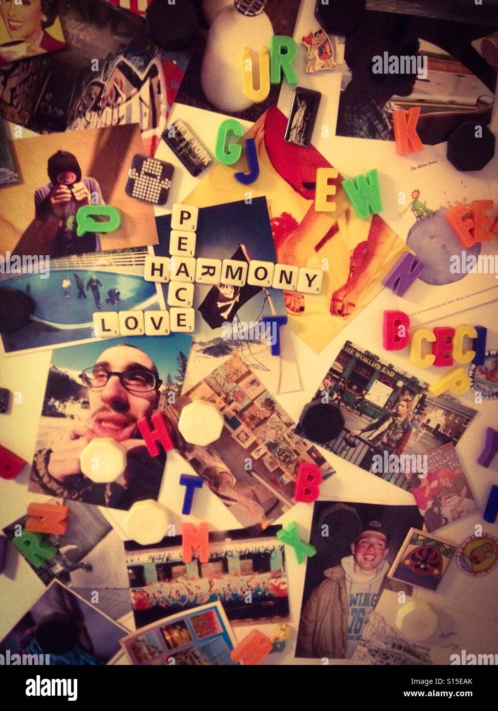 funky fridge with magnets, alphabet letters and photos Stock Photo - Alamy