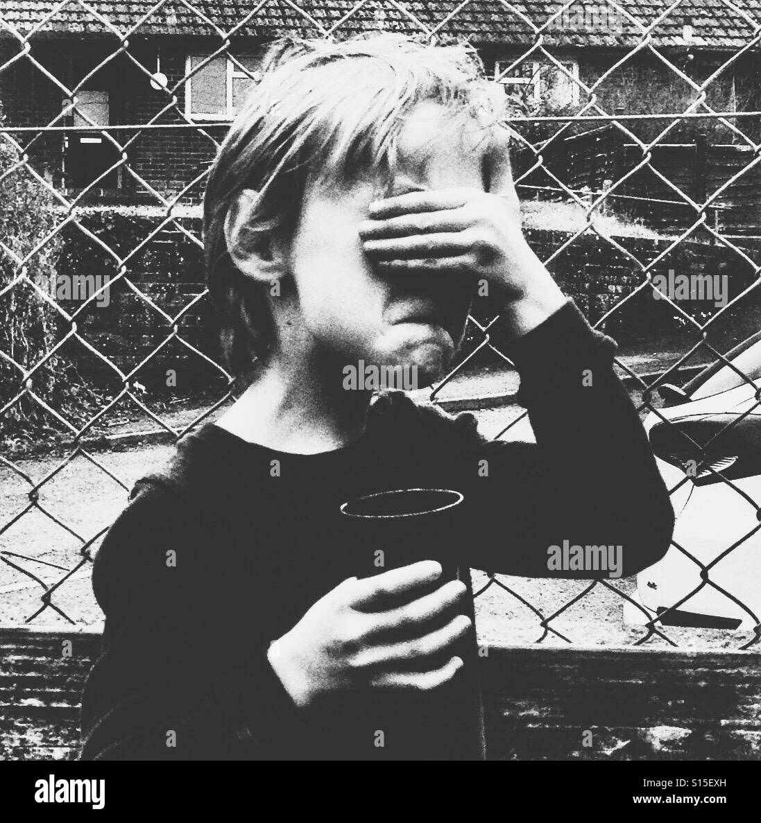 Hand over her eyes Black and White Stock Photos & Images - Alamy