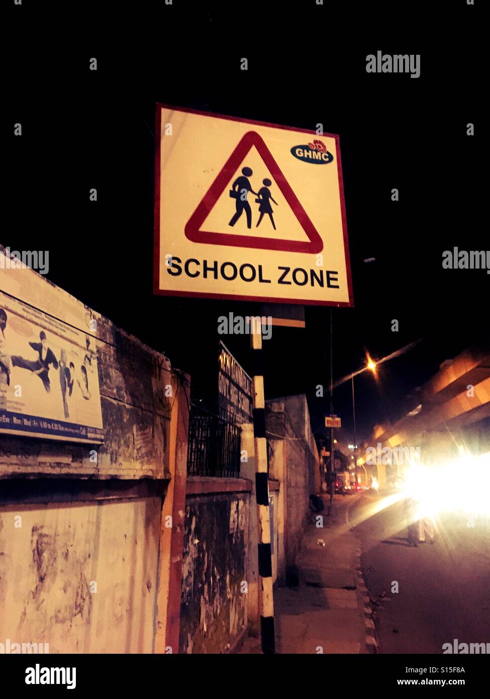School zone sign board Stock Photo - Alamy