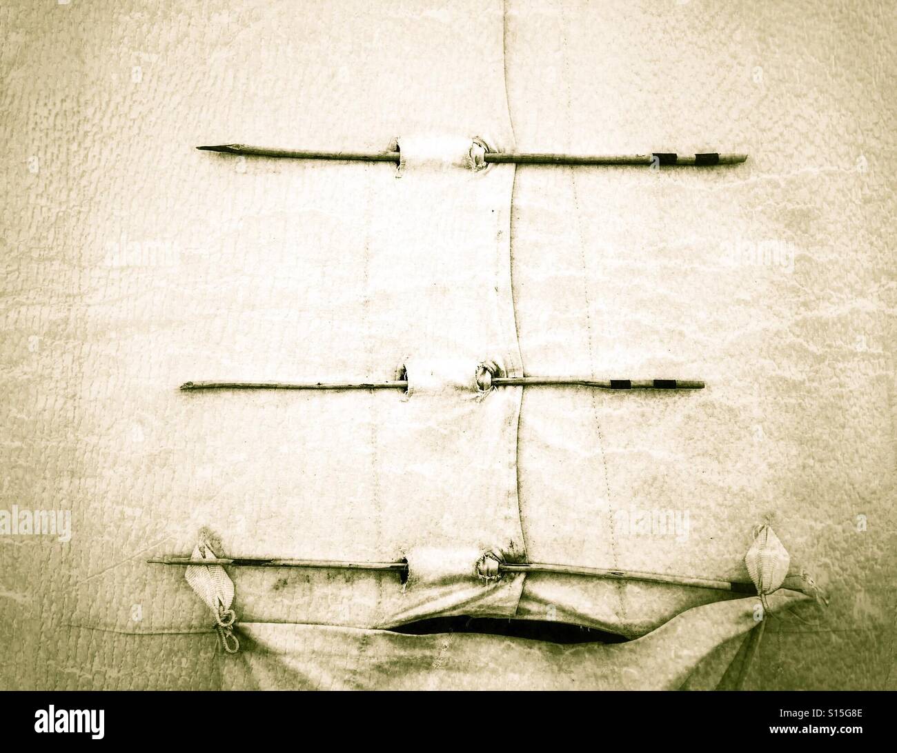 Decorative sticks tucked through a First Nations teepee above the flap ...