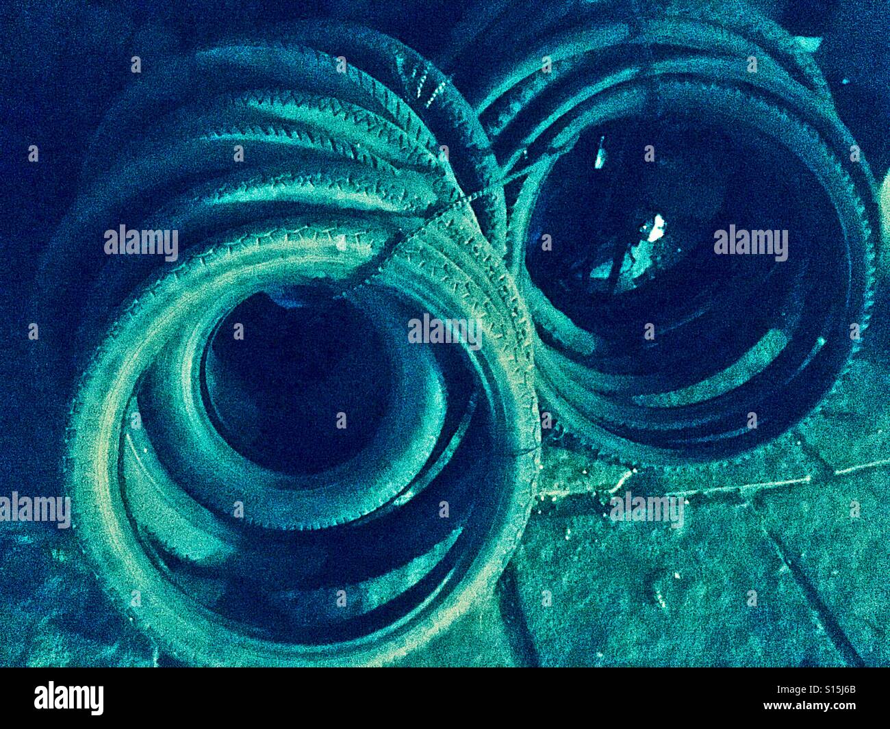Stack of old tyres Stock Photo - Alamy