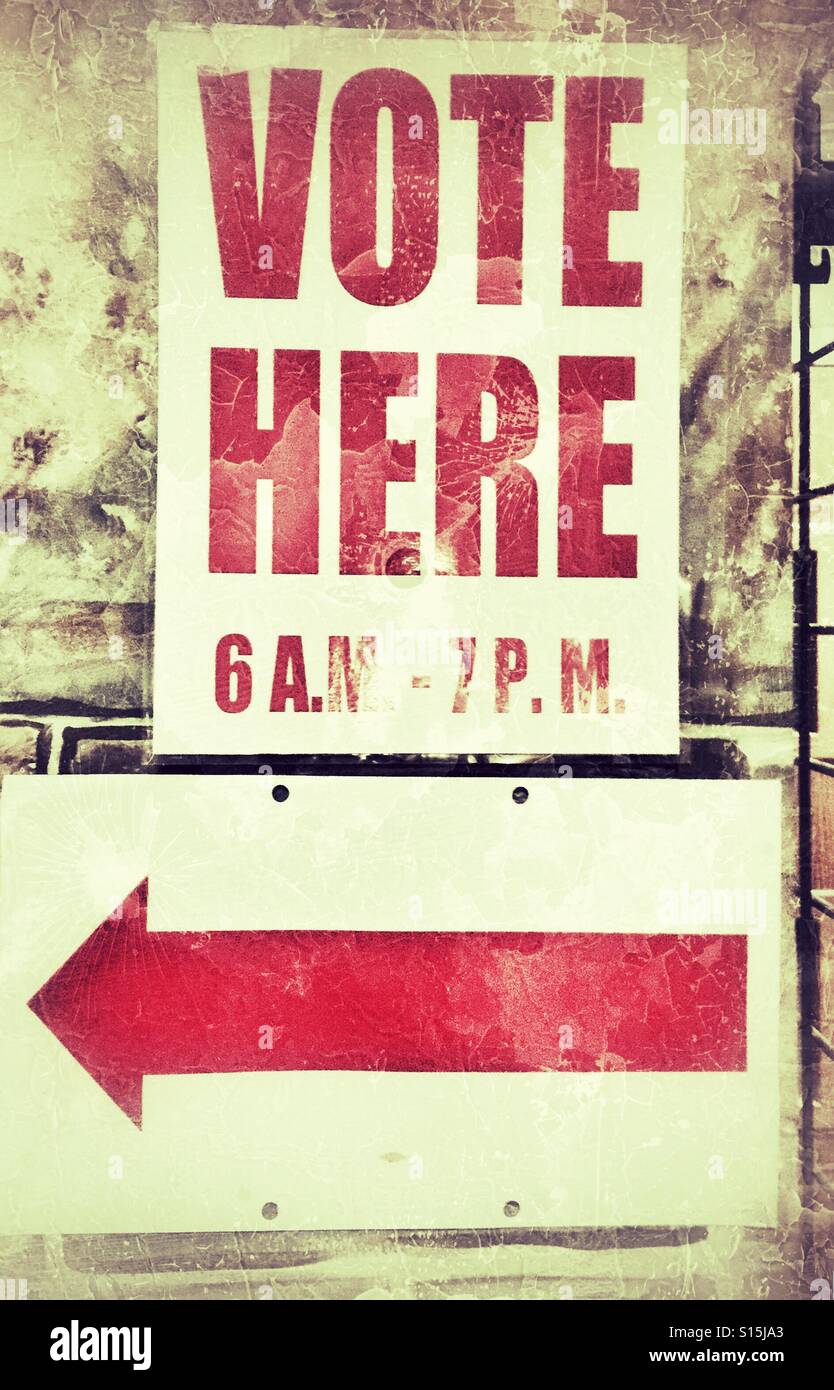 Vote here sign Election Day Stock Photo - Alamy