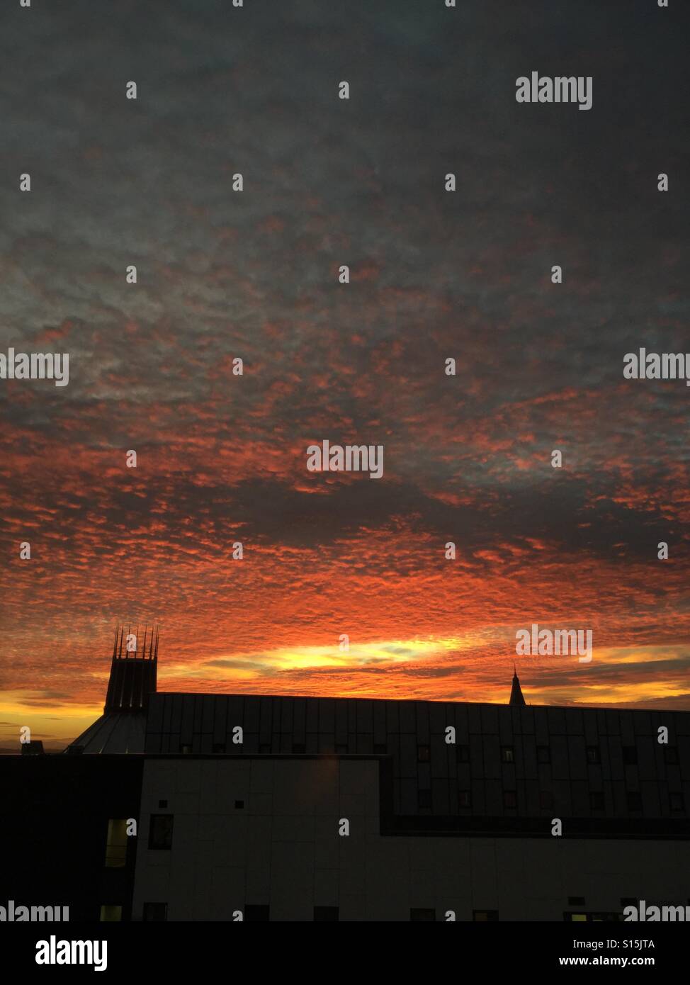 Red clouds sunset with Liverpool metropolitan cathedral Stock Photo - Alamy