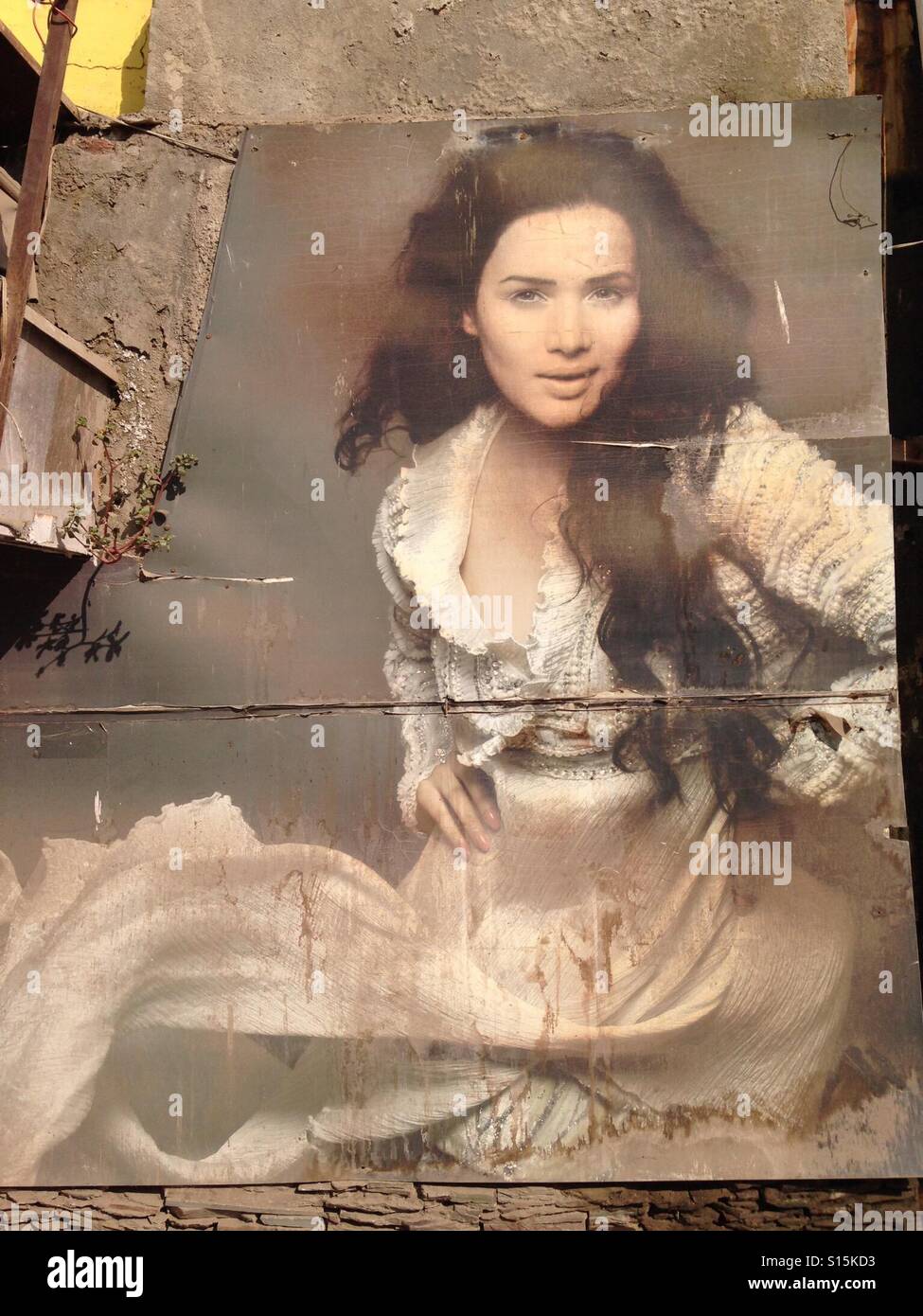 An old fashion poster decaying Stock Photo - Alamy