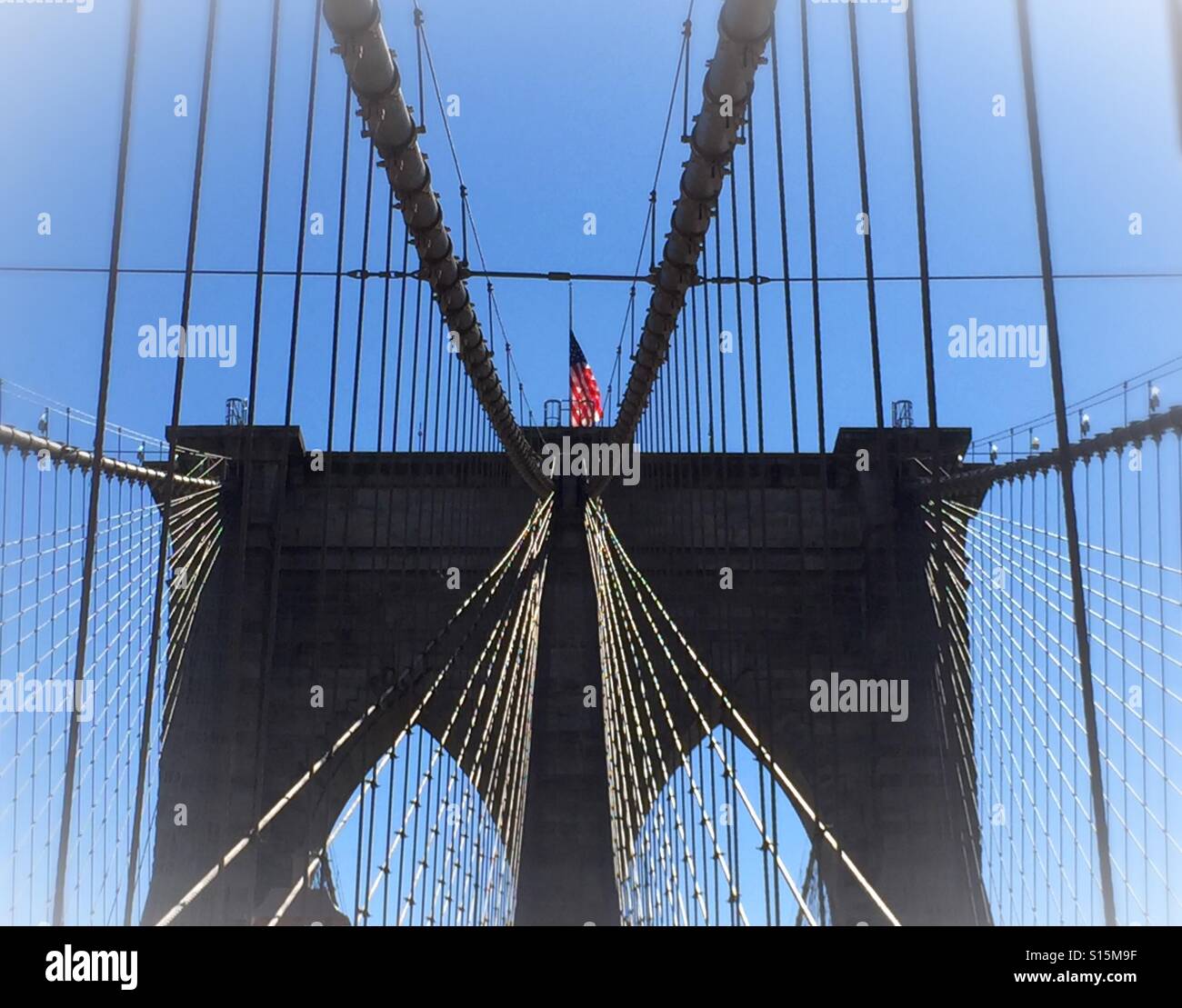 Looking up through cables at stanchion on Brooklyn Bridge, NYC Stock ...
