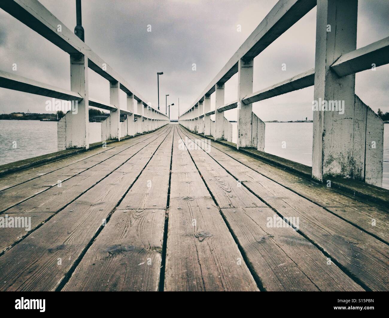 Lonely wooden pier hi-res stock photography and images - Alamy