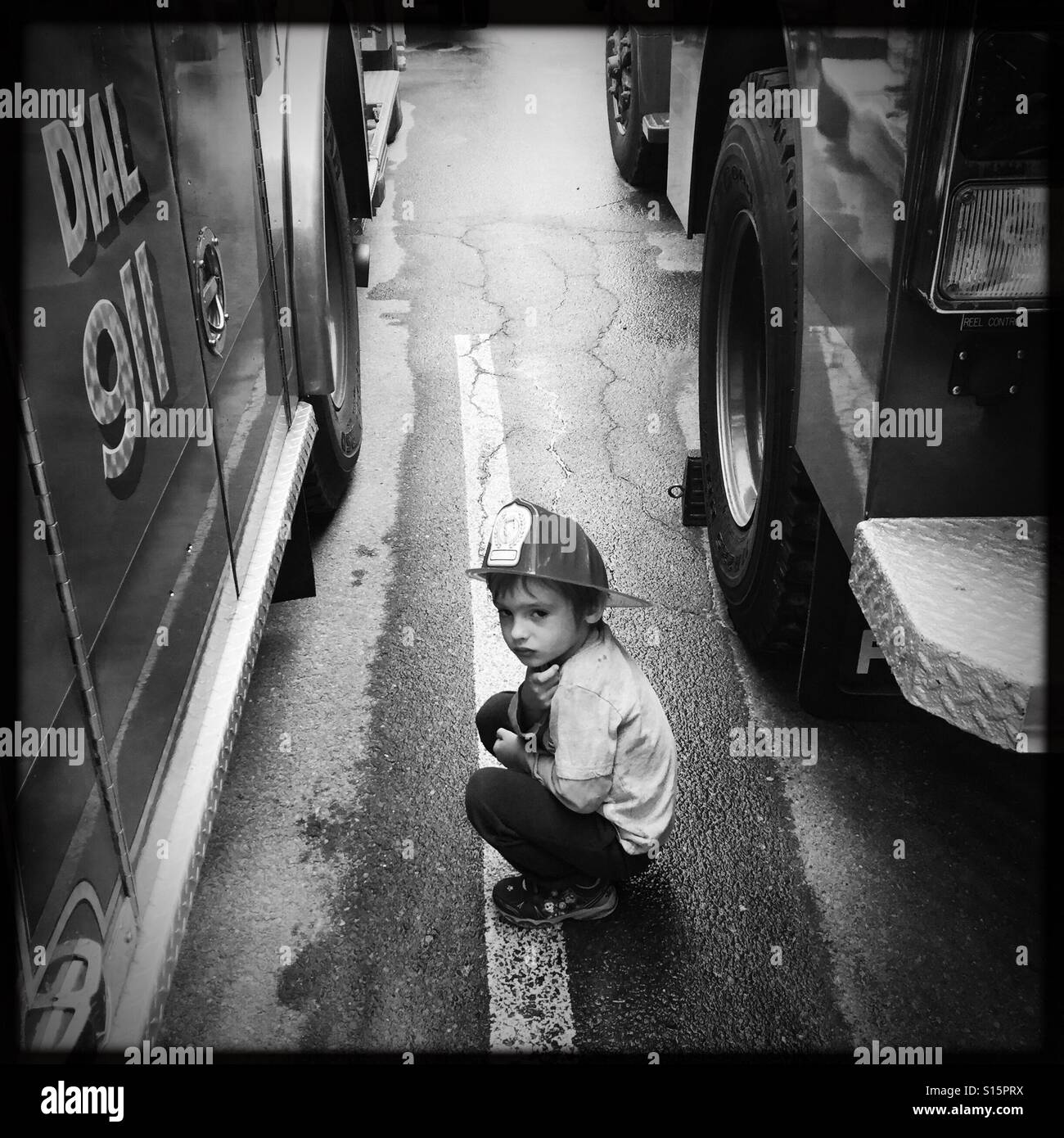 Boy crouches hi-res stock photography and images - Alamy