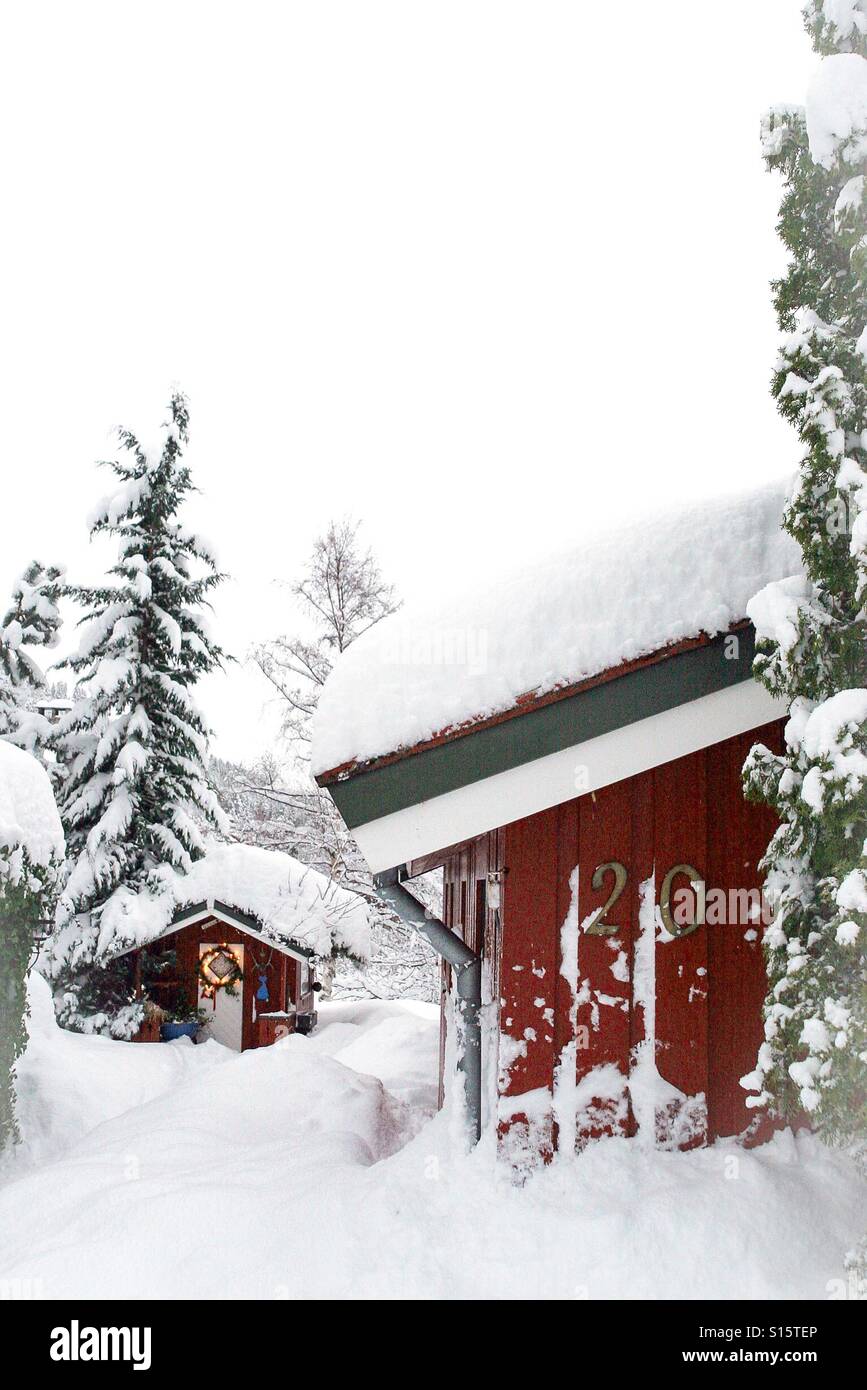 House almost covered in snow Stock Photo - Alamy