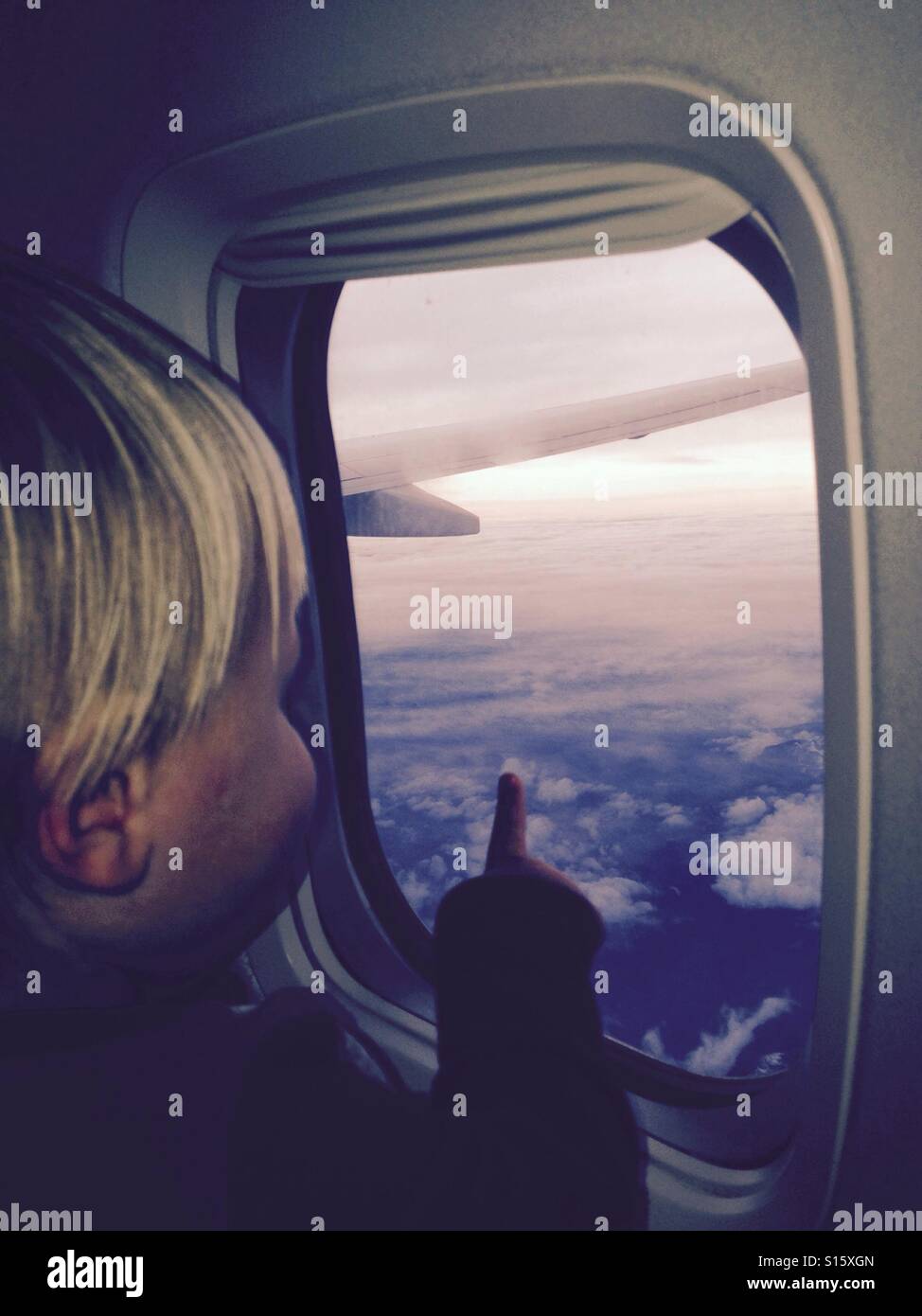 Boy Pointing Out Window High Resolution Stock Photography and Images ...