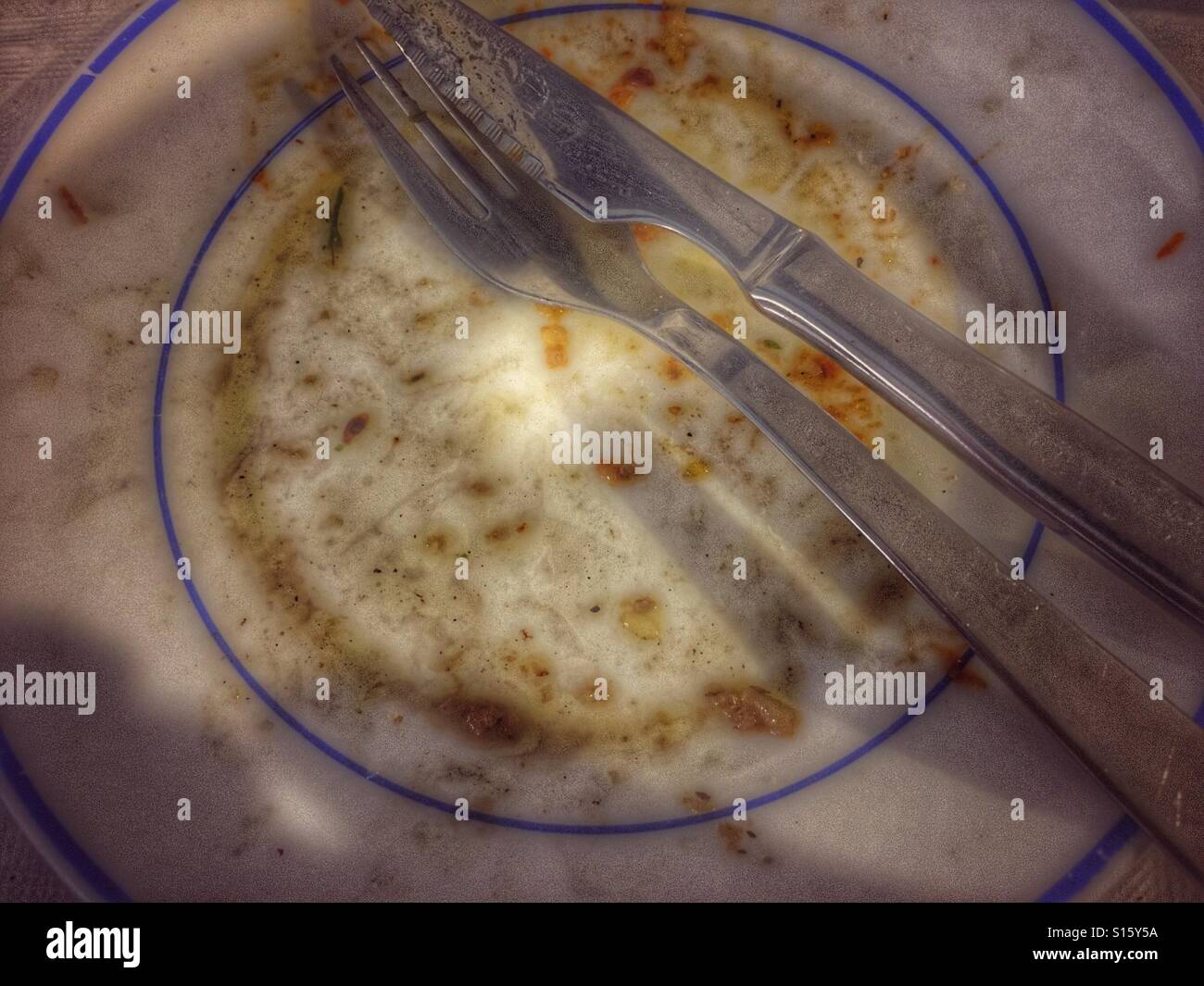 Finished! Empty plate Stock Photo - Alamy