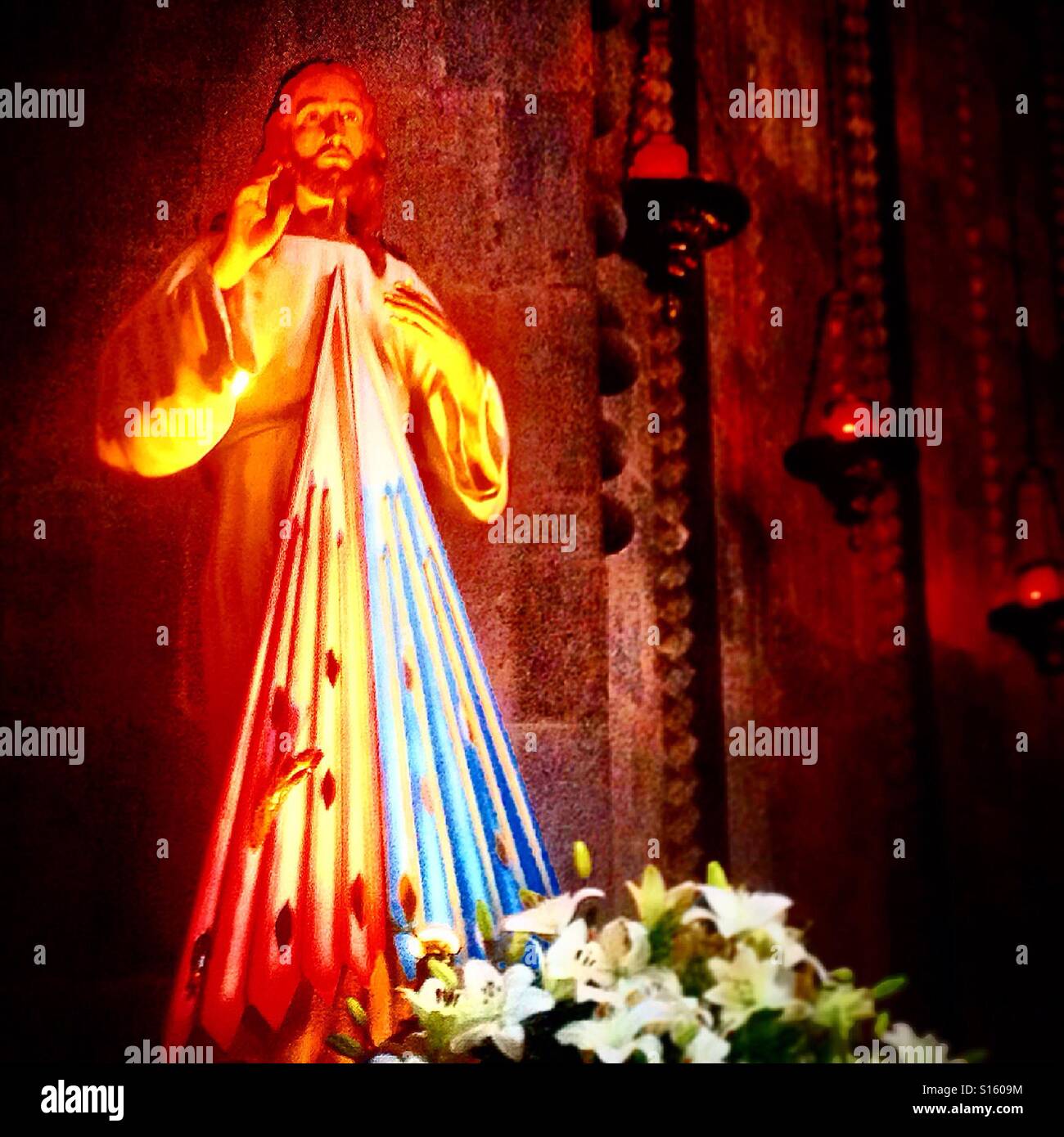 An image of Jesus Christ is displayed in a church in Mexico City ...