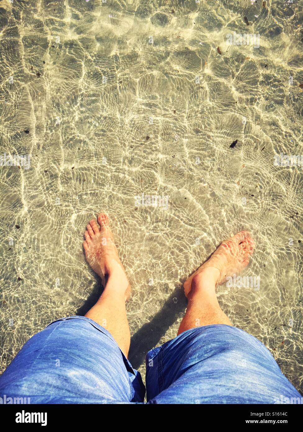 Feet in the Mediterranean Sea Stock Photo - Alamy