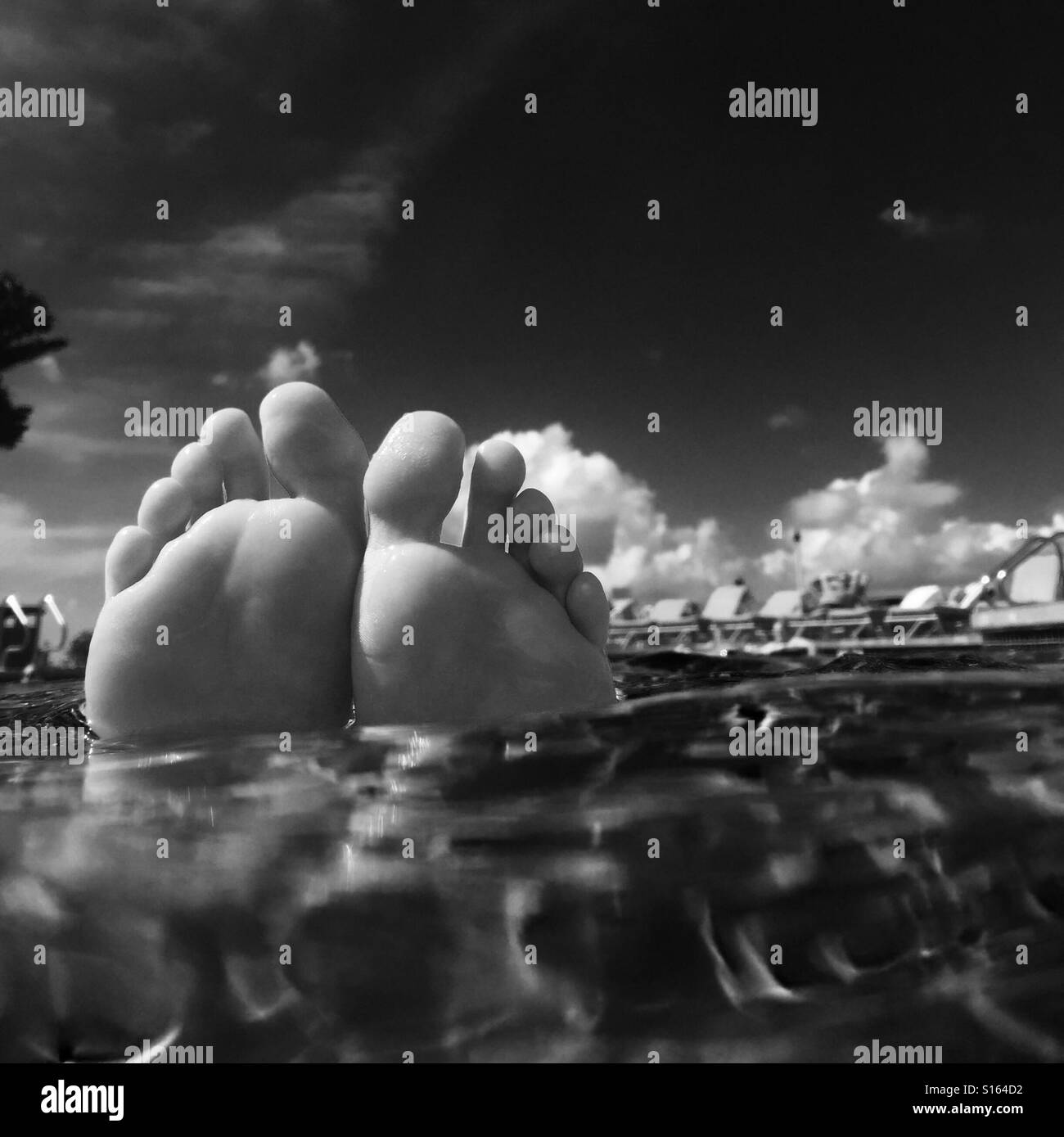 Feet floating floating Black and White Stock Photos & Images - Alamy