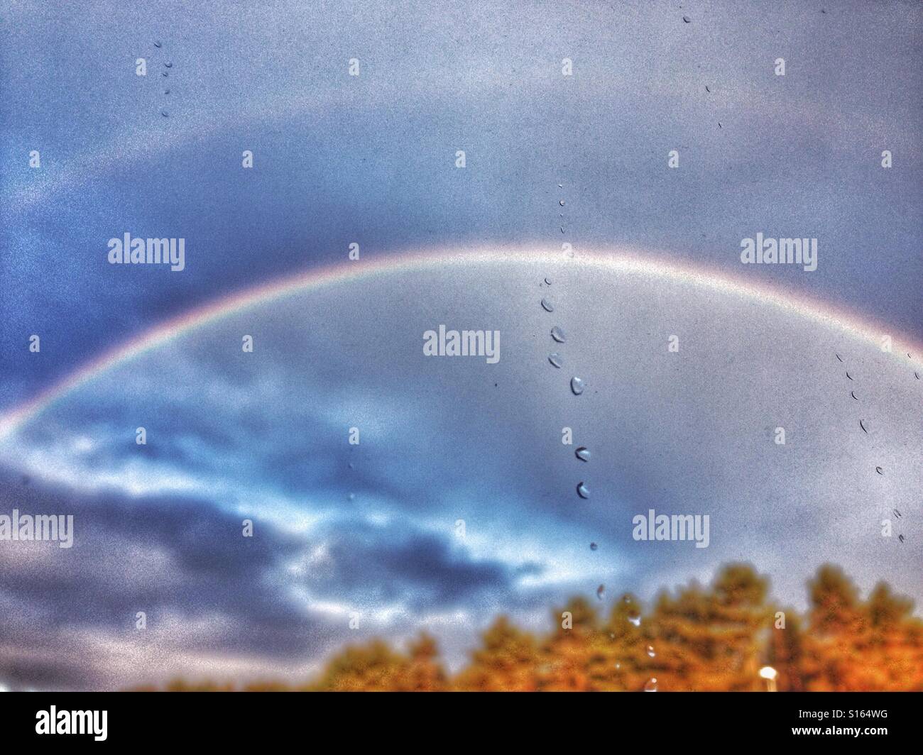 Rainy day with double rainbow hi-res stock photography and images - Alamy