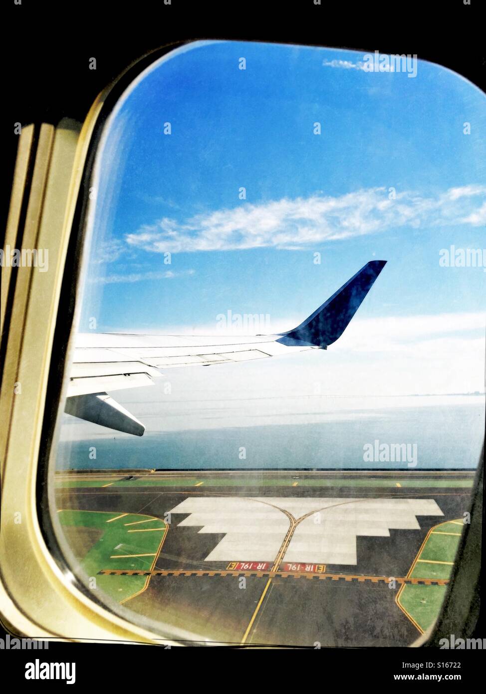 Looking out window as airplane takes off Stock Photo - Alamy